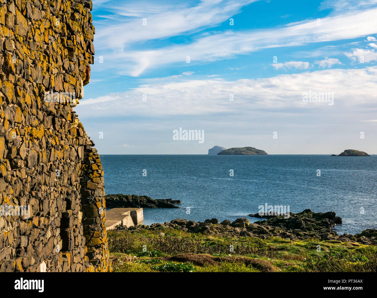Ruined wall of lazaretto on Fidra Island, with Bass Rock and Firth of ...
