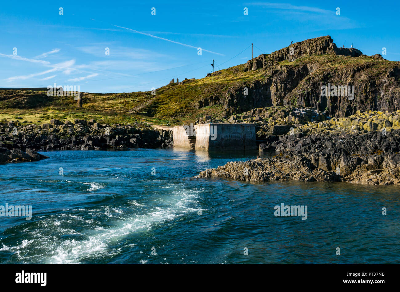Wake of boat and landing pier, Fidra Island, Firth of Forth, East ...