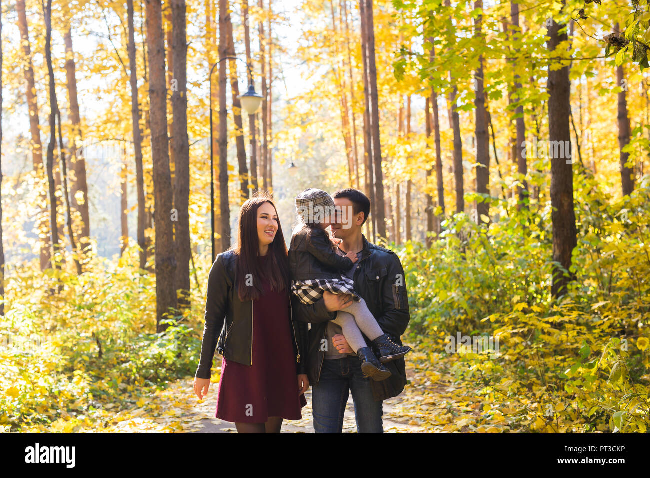 Children, nature and family concept - Portrait of happy family over ...