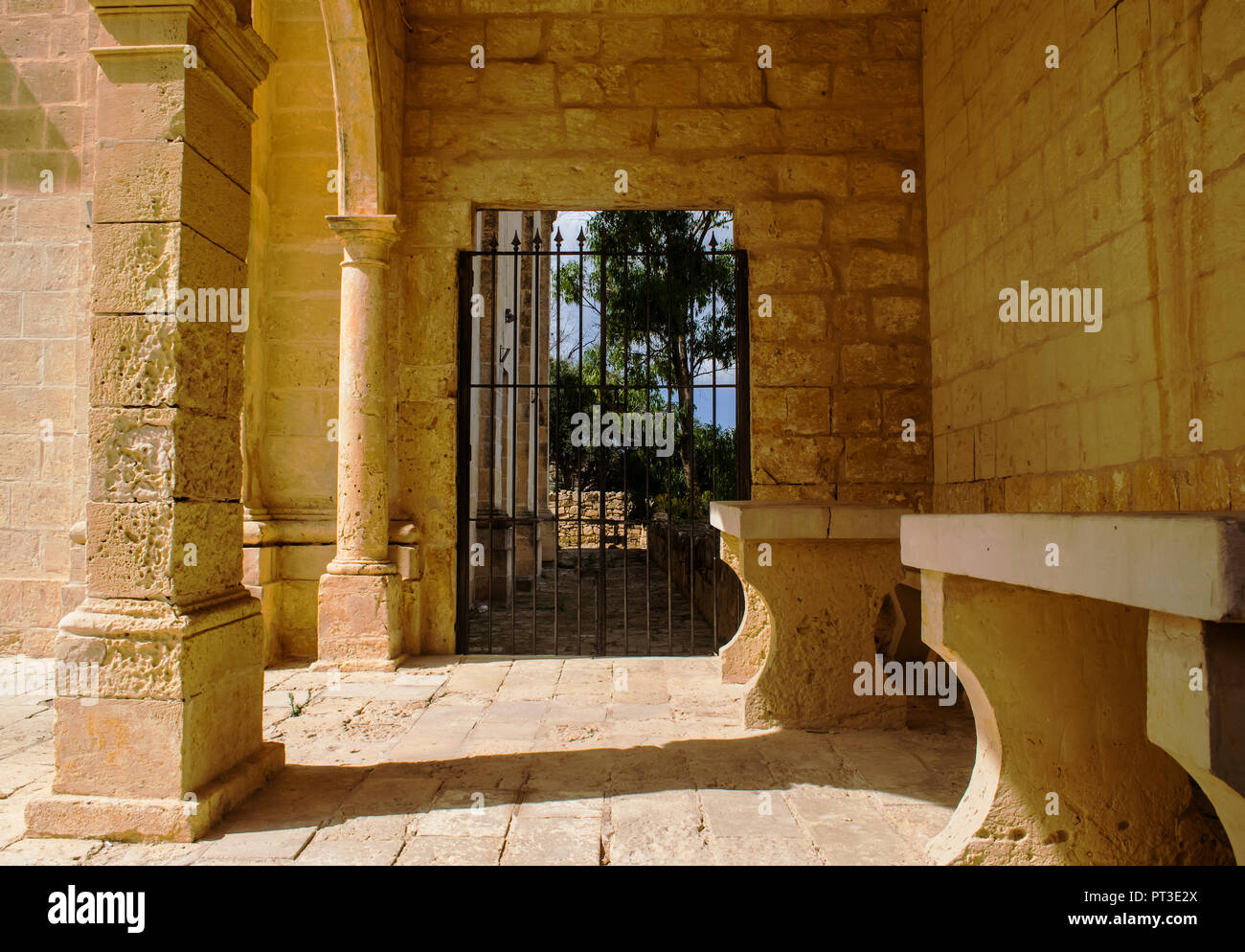Behind an old iron gate Stock Photo - Alamy