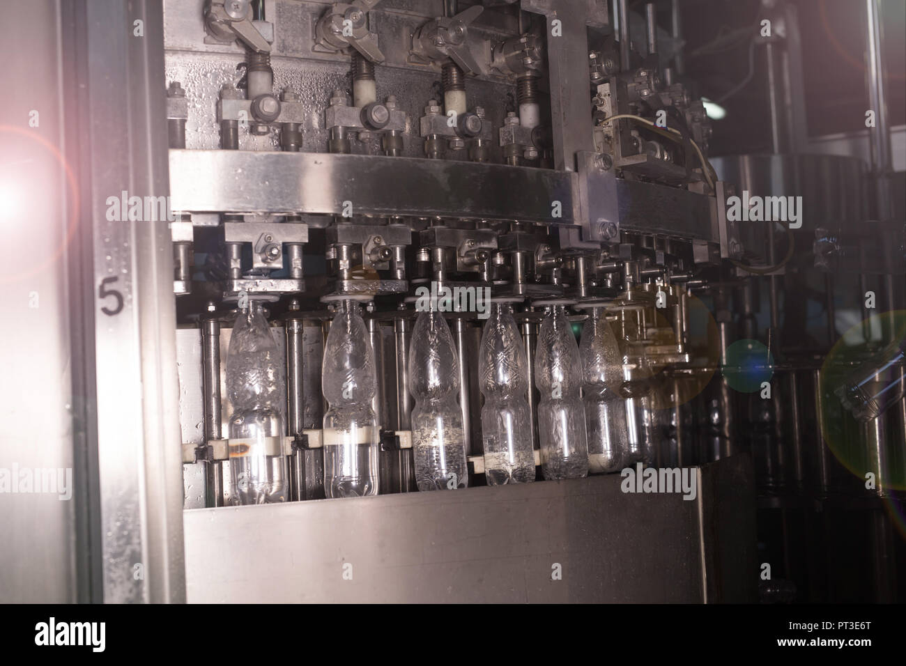 Production line in a factory for mineral water Stock Photo - Alamy