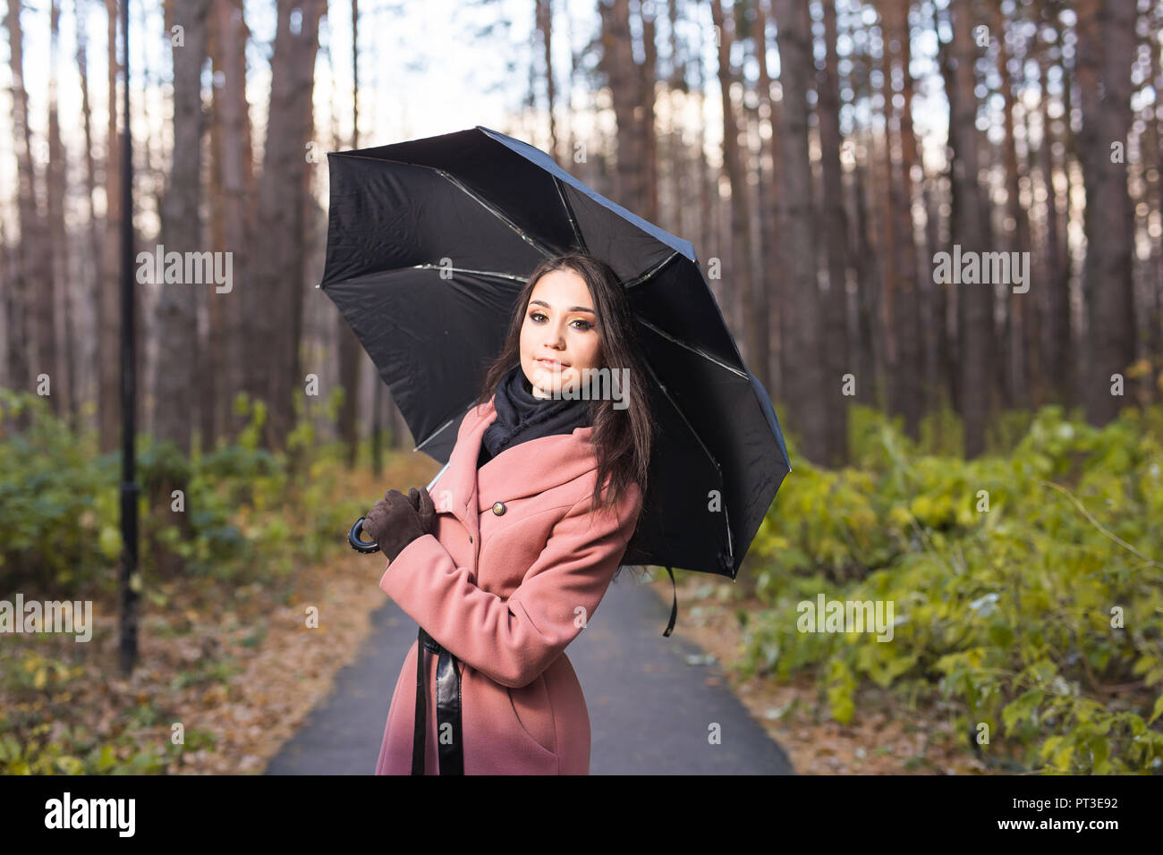 Woman raincoat forest portrait happy nature hi-res stock photography ...