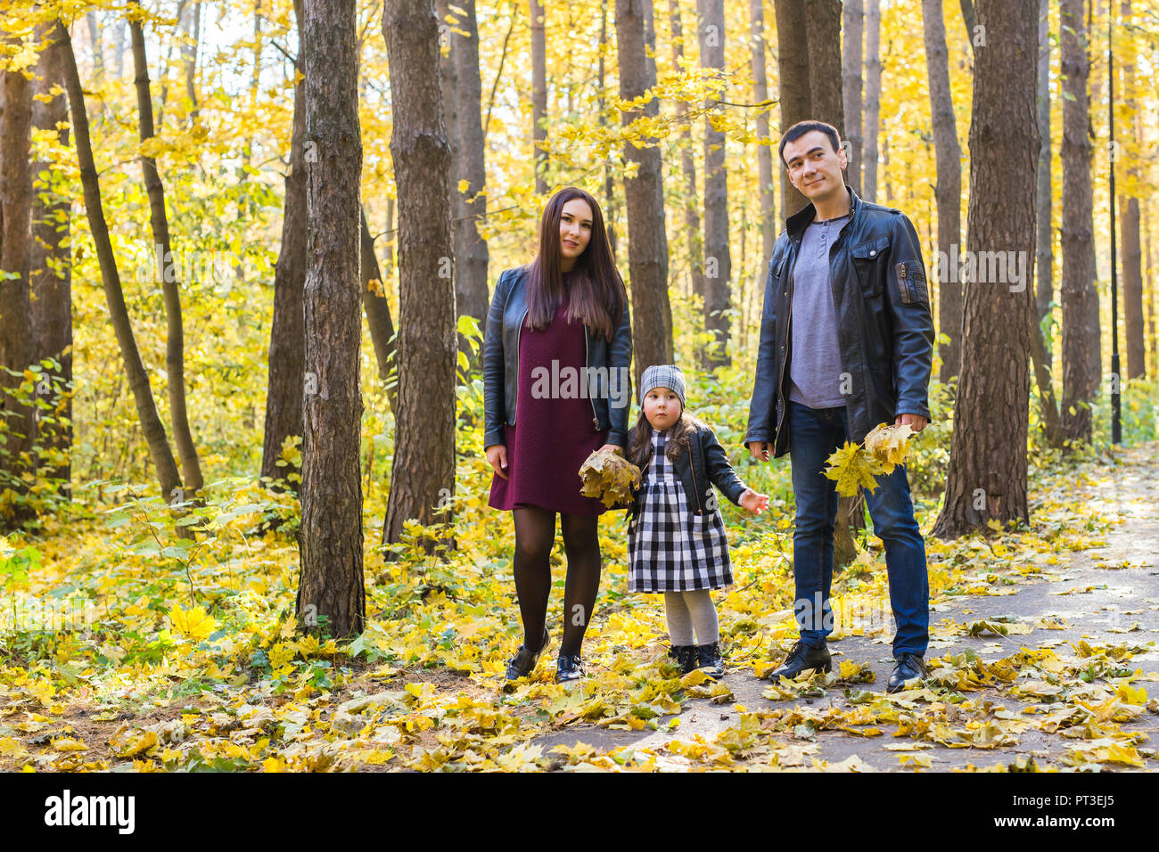 Children, nature and family concept - Portrait of happy family over ...