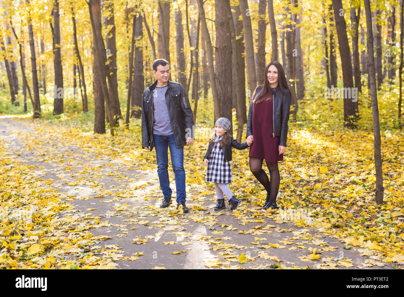 Parks, nature and family concept - Happy family walking in park Stock ...