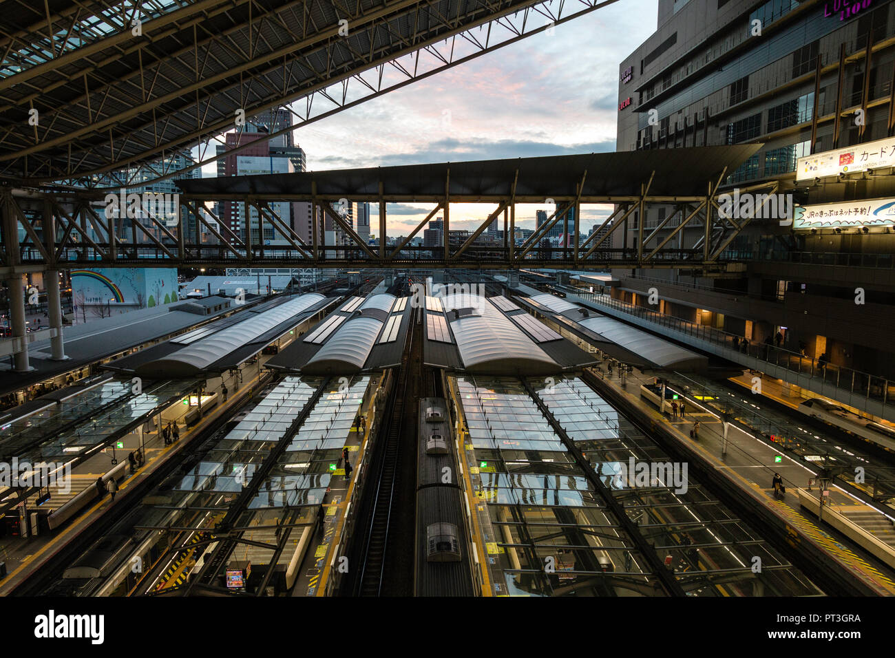Osaka Station City. High angle view over the platforms and tracks with ...