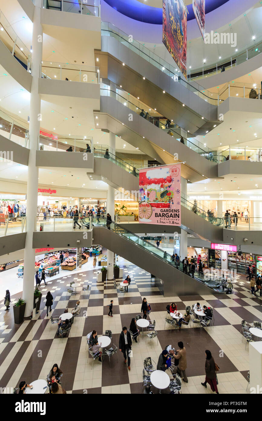 Interior of Nishinomiya Gardens shopping center, Japan. Large atrium ...