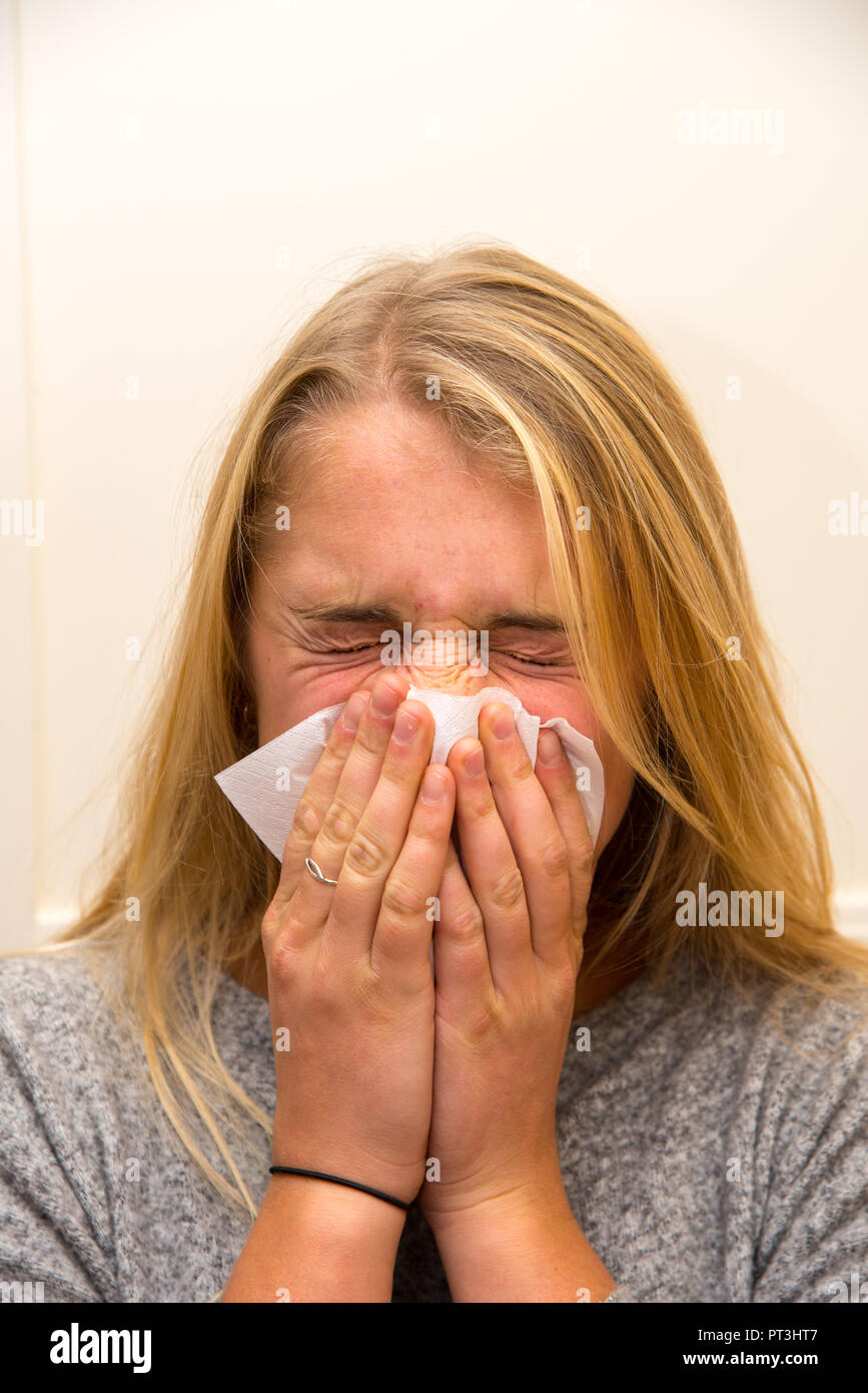Sneezing hi-res stock photography and images - Alamy