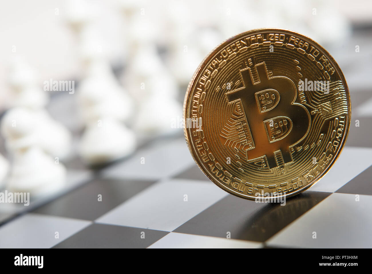 Golden bitcoin coin symbolizes elements of virtual economy or crypto ...