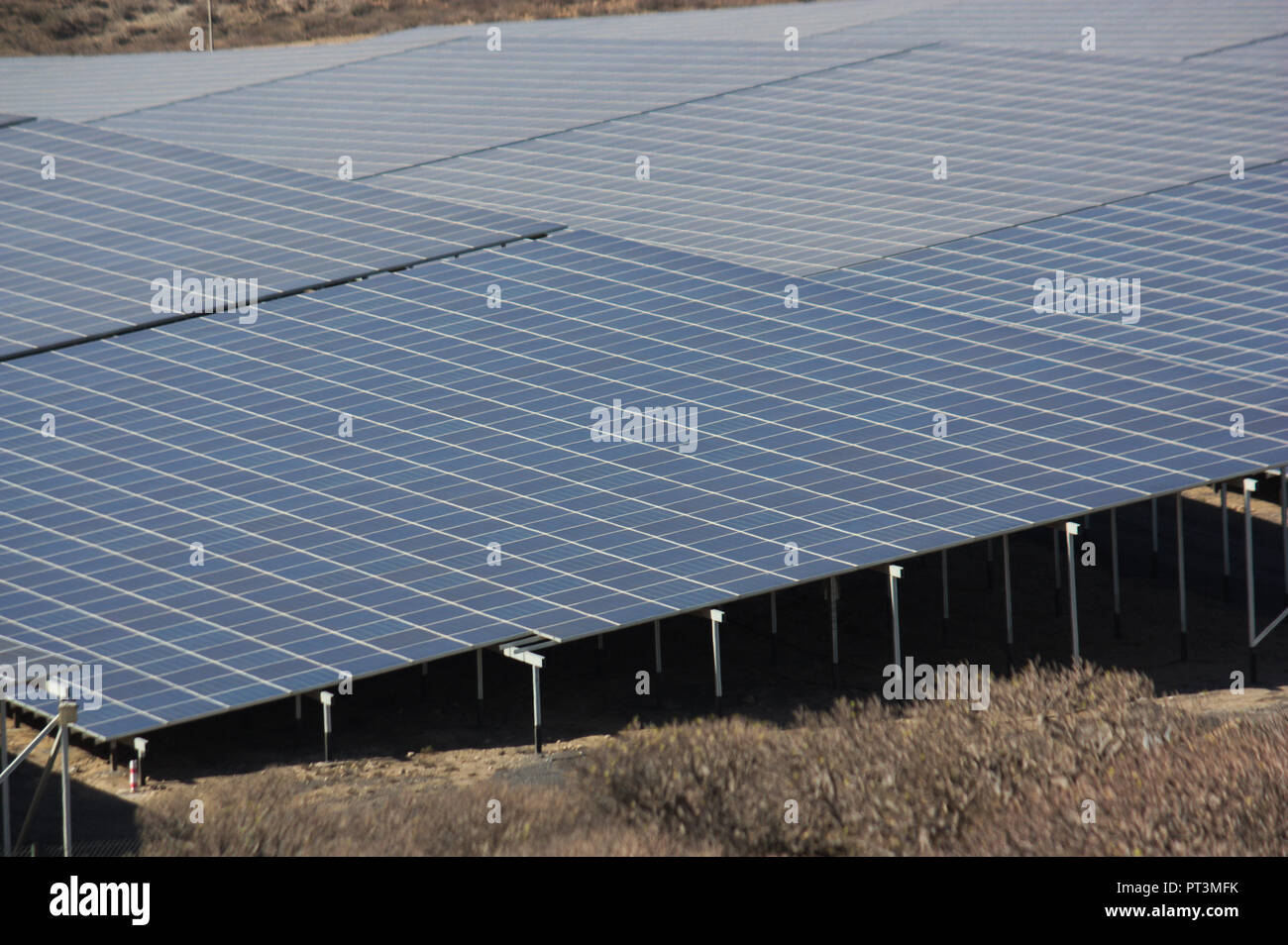 Side view of a set of solar panels in a photovoltaic plant Stock Photo ...