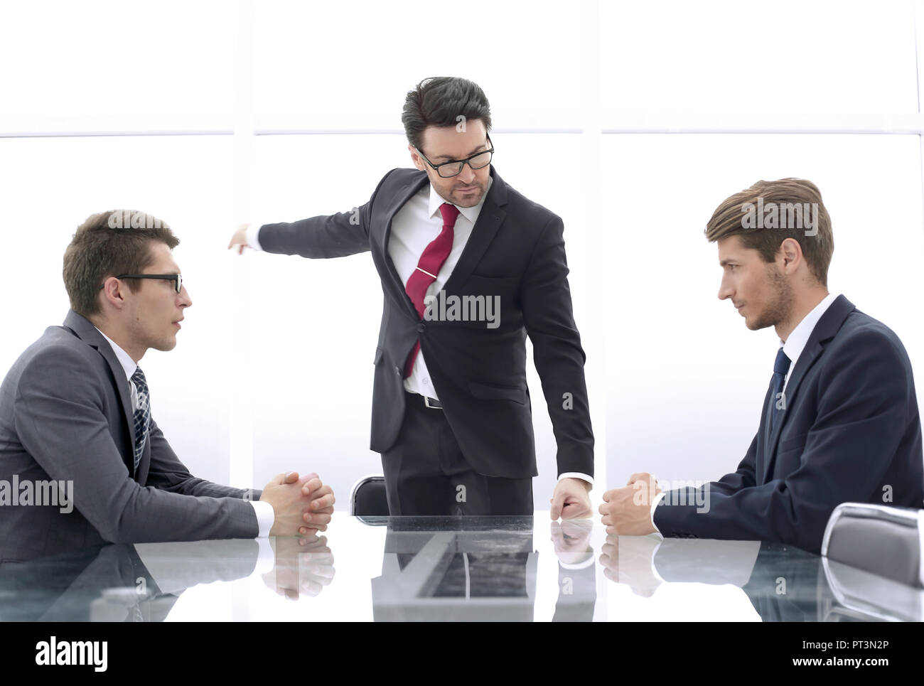 angry boss points an incompetent employee to the door.the concept of ...