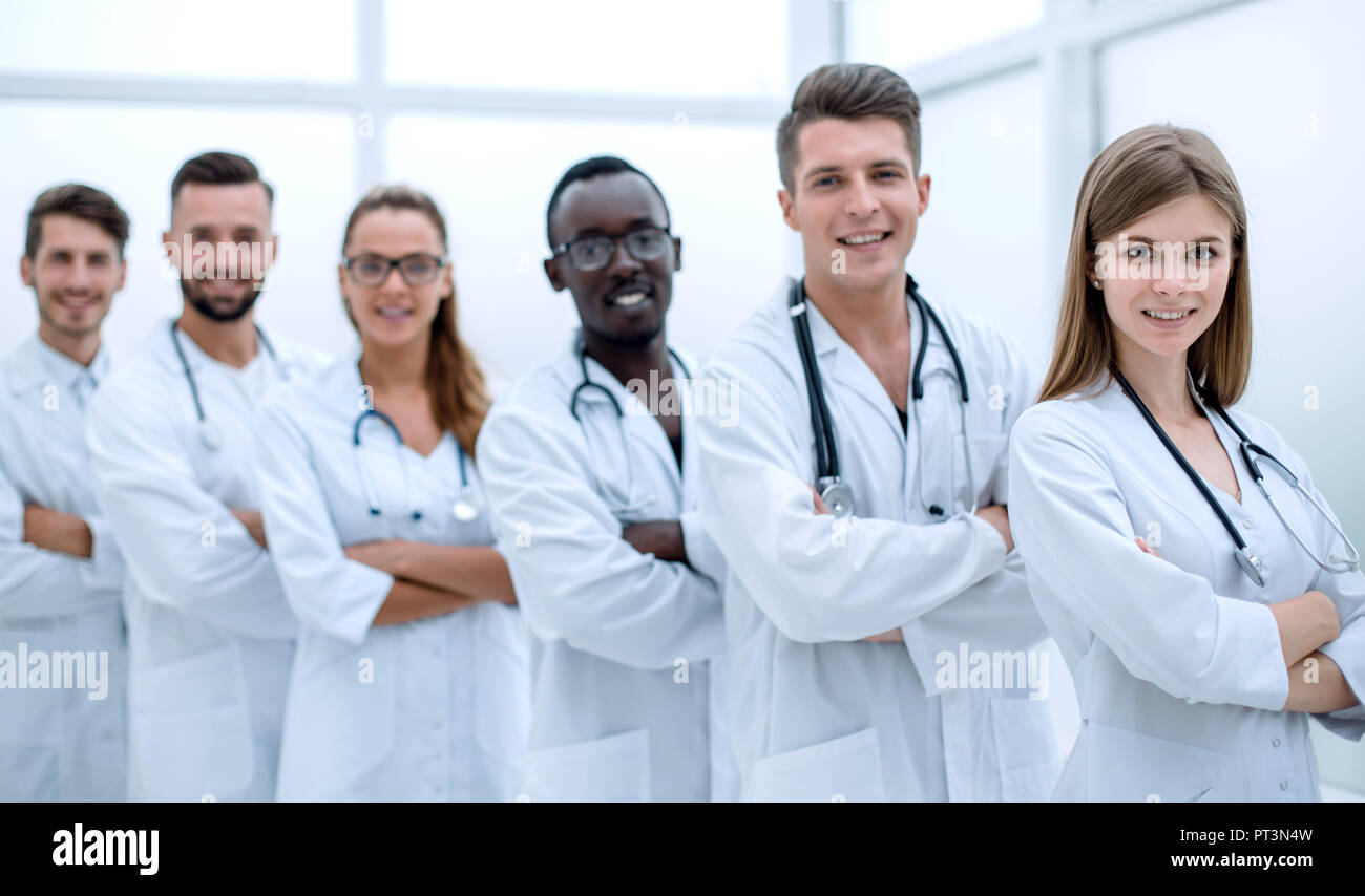 Beautiful group doctors together smiling isolated white Stock Photo - Alamy Beautiful group doctors together smiling isolated white Stock Photo - Alamy