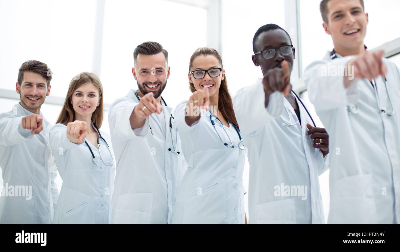 Very happy group of doctors isolated over a white background Stock ...