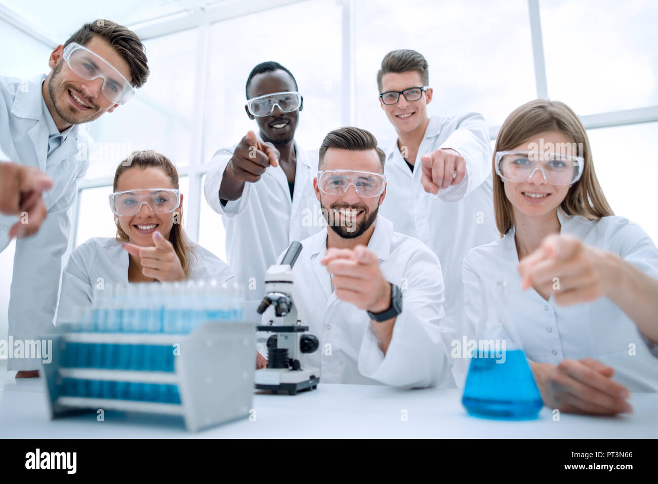 Medical doctors forensics team work on chemical research experiments ...