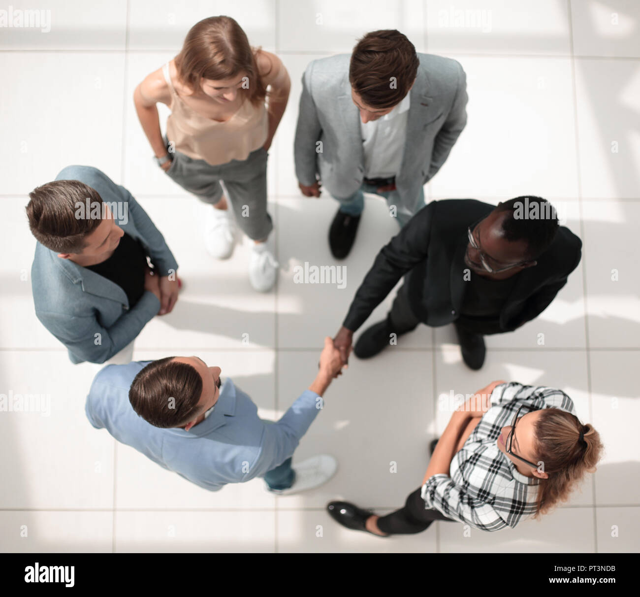 Handshake of business group leader, applause Stock Photo - Alamy
