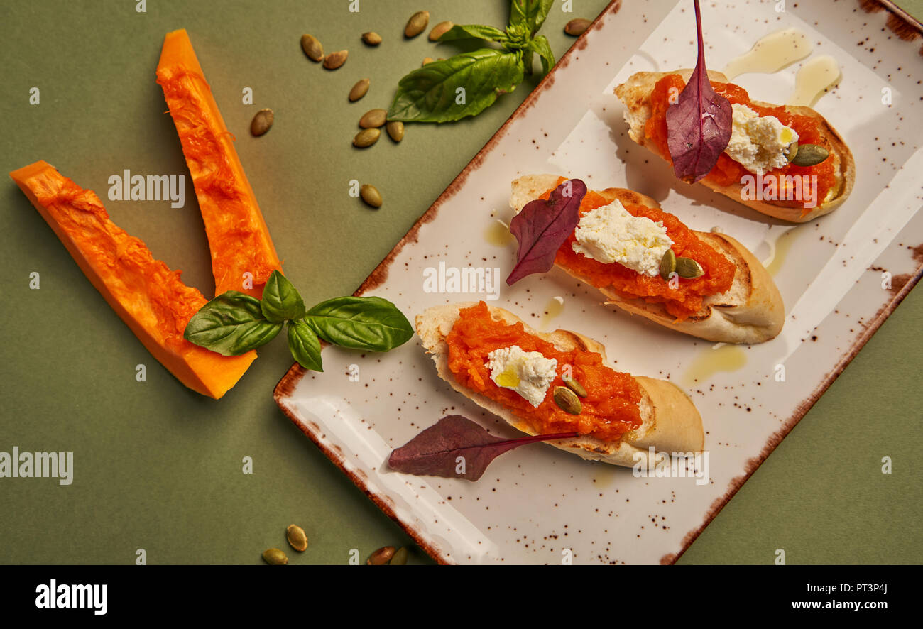 pumpkin dish with a salad and biscuits Stock Photo - Alamy