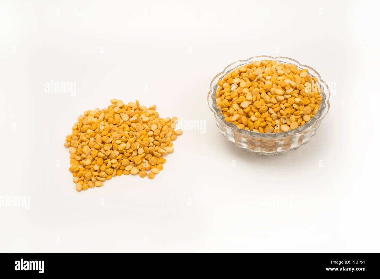 Yellow split peas pulse. isolated on white background Stock Photo - Alamy