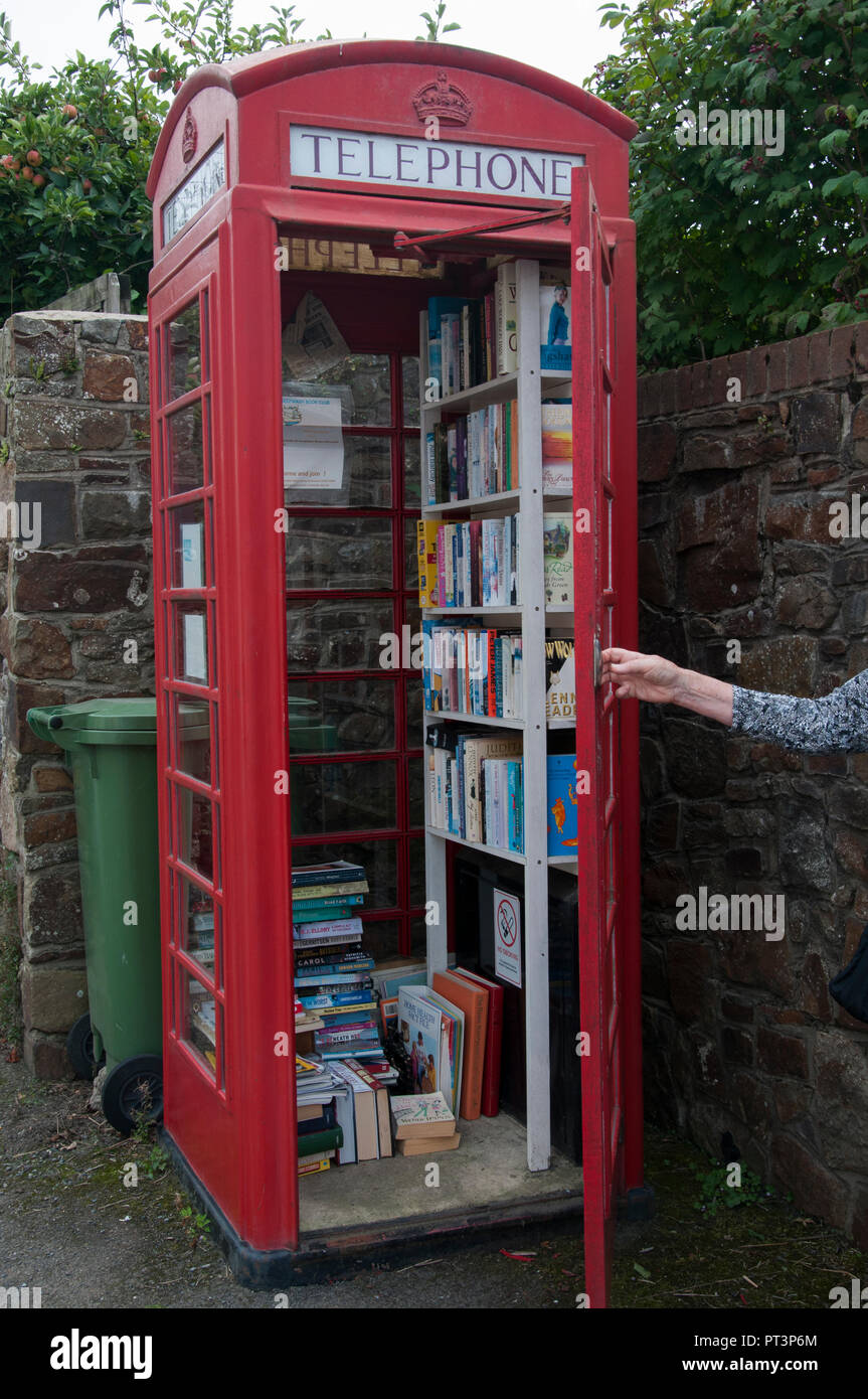 An archetypical British phone box repurposed as a community book ...