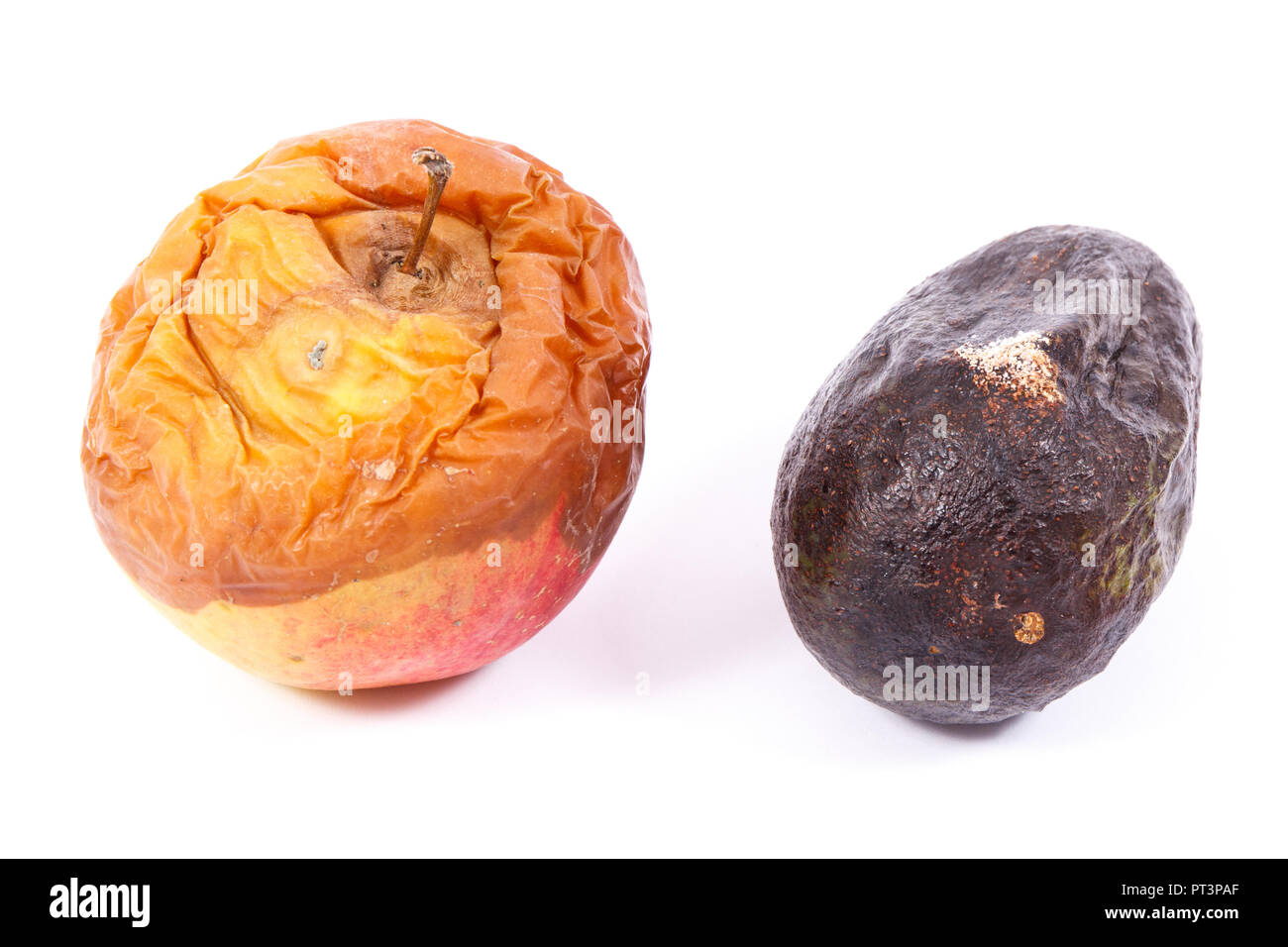 Old wrinkled fruits with mold on white background, unhealthy food Stock ...