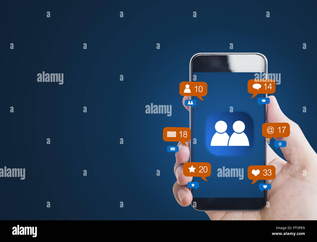 Hand holding mobile smart phone, with social media notification icons ...