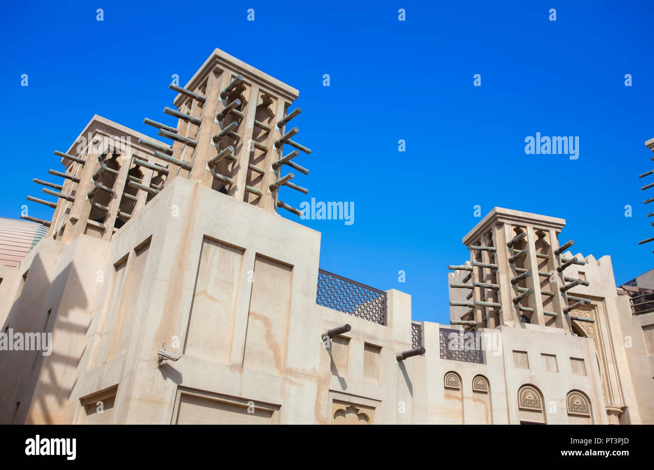 traditional Arab wind tower for air conditioning and cooling on top of ...