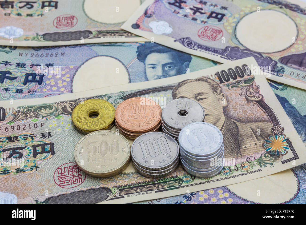 Japanese yen banknotes and Japanese yen coin concept background Stock ...