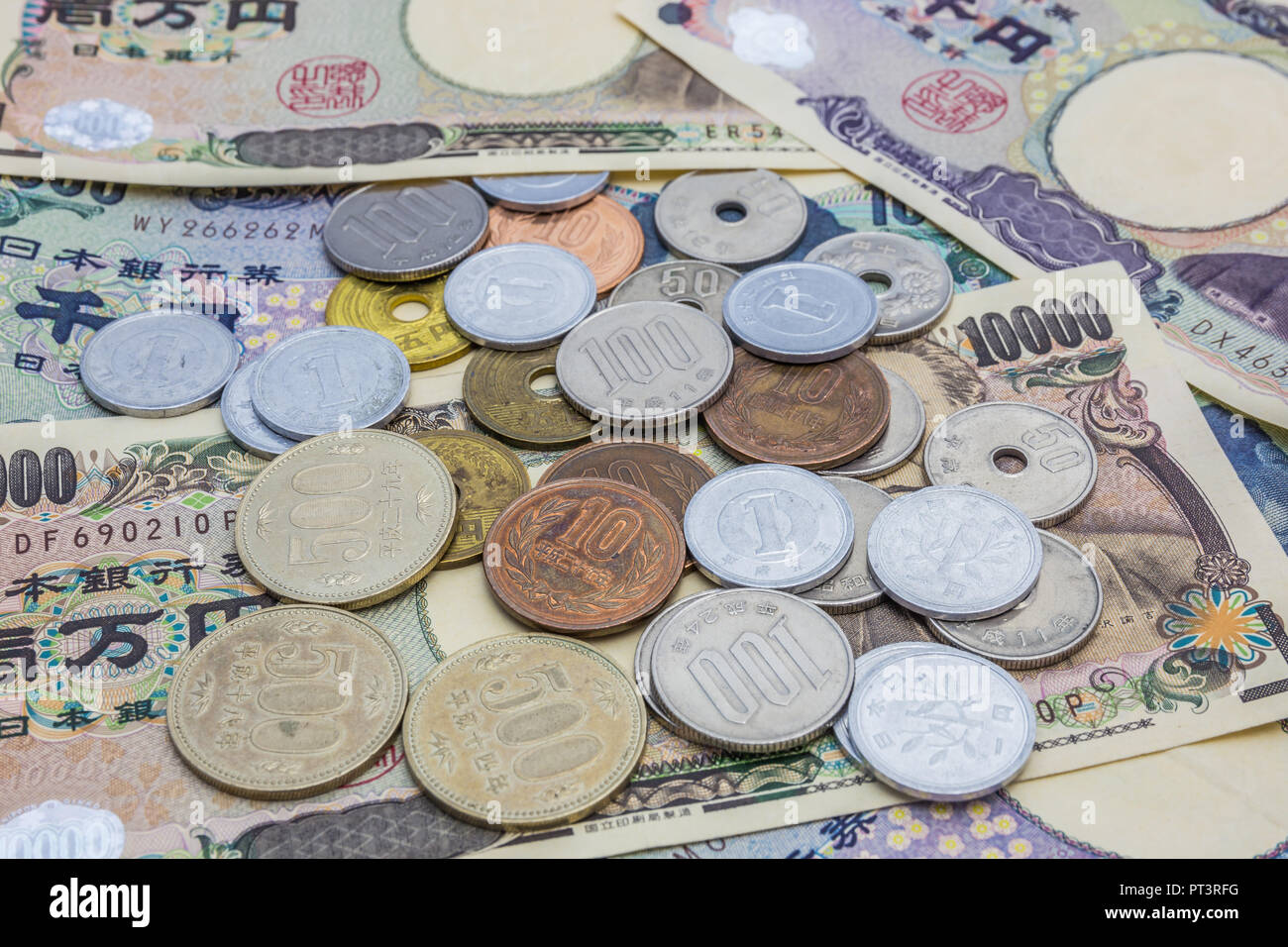 Japanese yen banknotes and Japanese yen coin concept background Stock ...