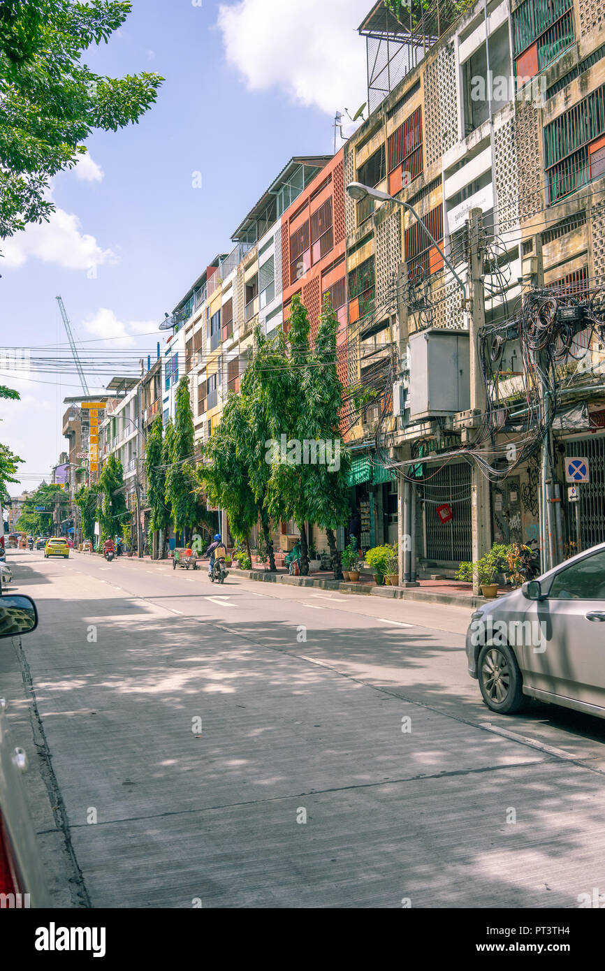 Colorful Buildings on Bangkok Street with Green Plants Stock Photo - Alamy