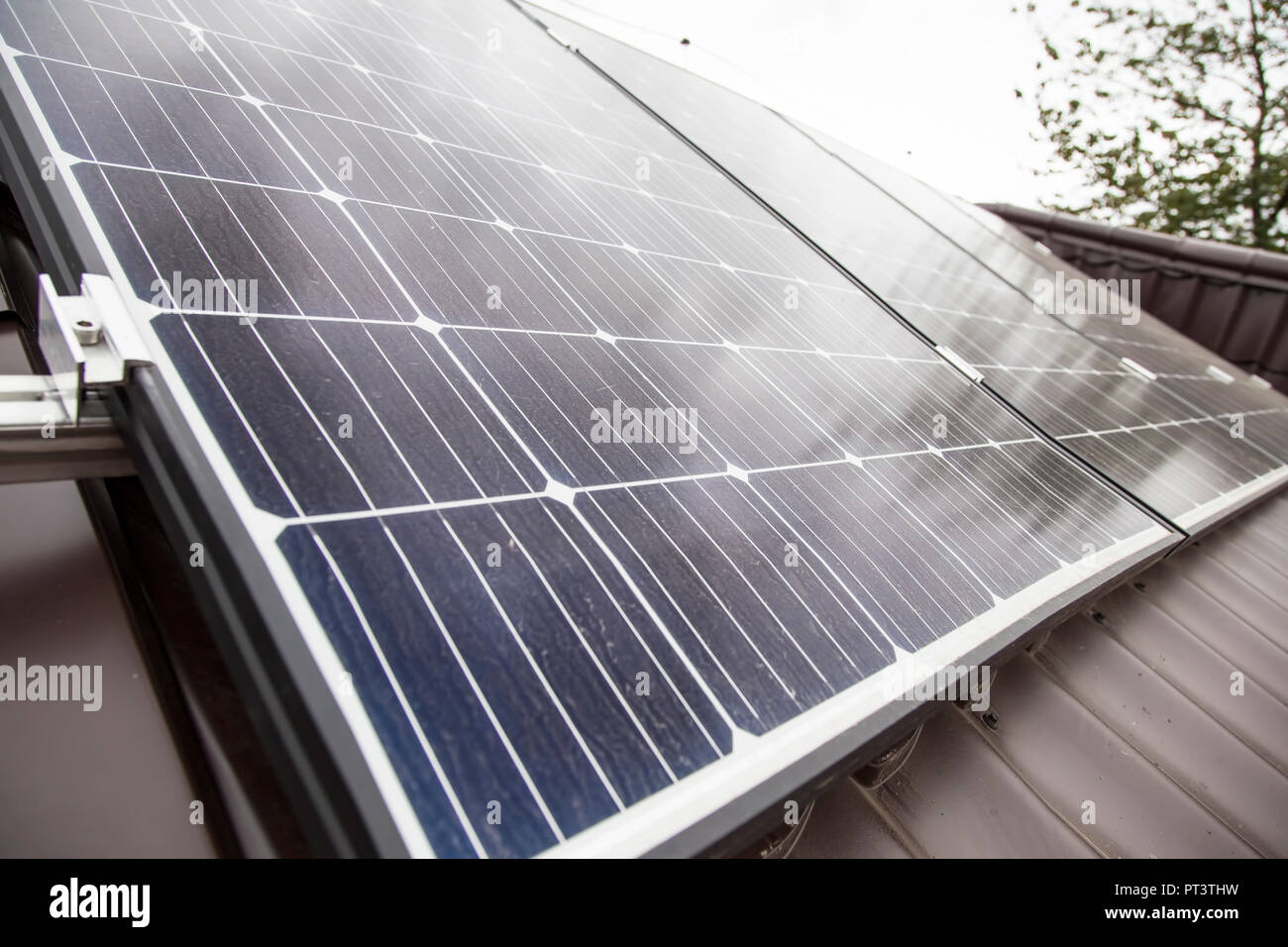 House roff with solar panels, renewable solar power technology panels ...