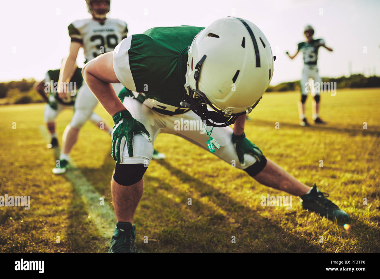 Young players stretching hi-res stock photography and images - Alamy