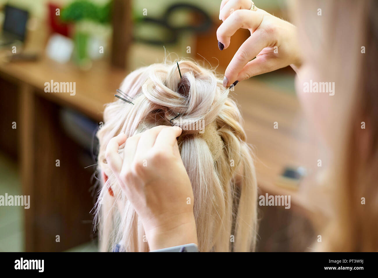 Hair styling process hi-res stock photography and images - Alamy