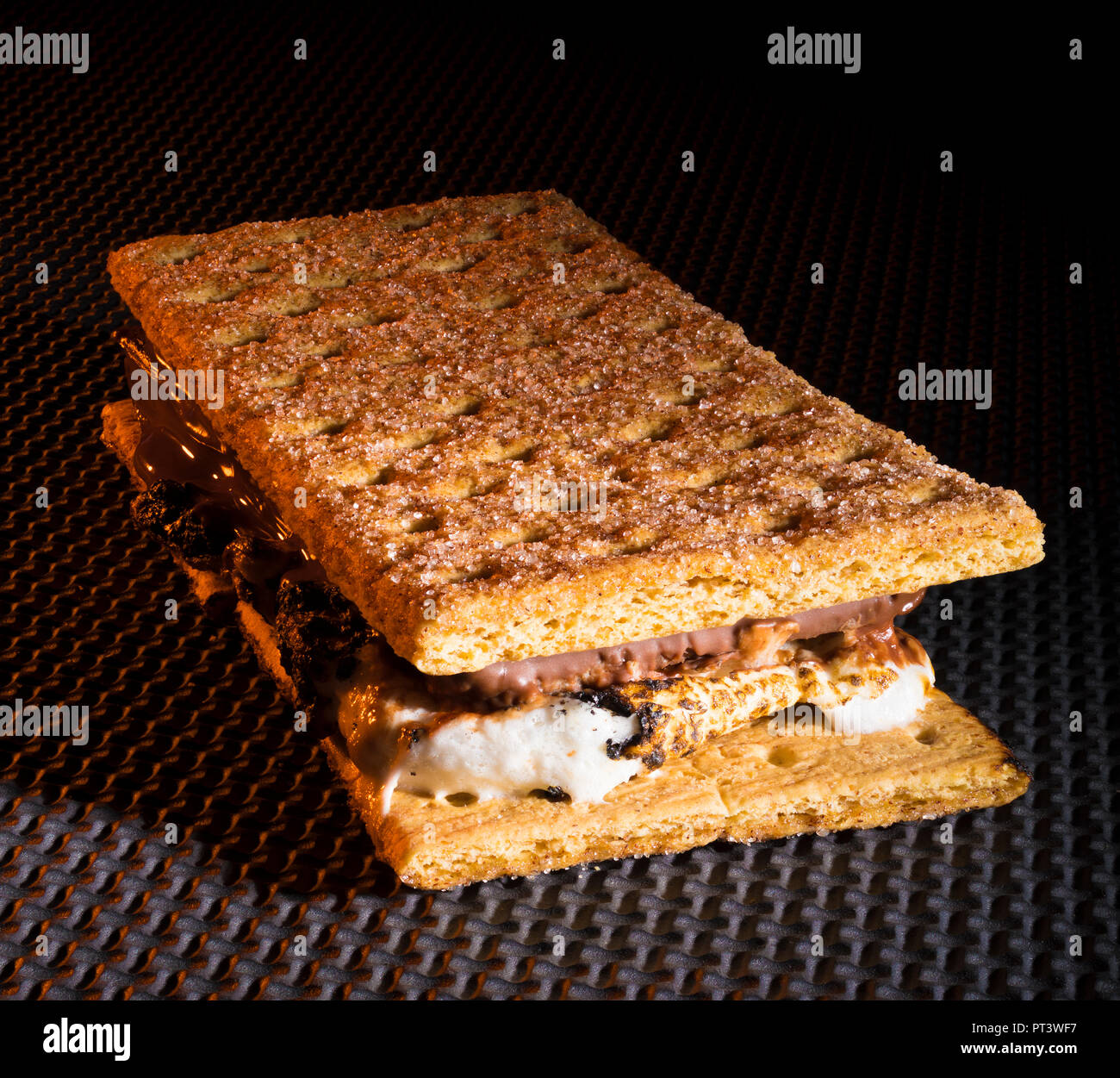 Smore fresh from the campfire and on a textured mat Stock Photo - Alamy