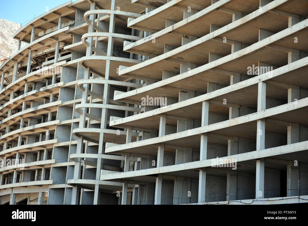 Abandoned and unfinished hotel in Montenegro. Close view of hotel ...