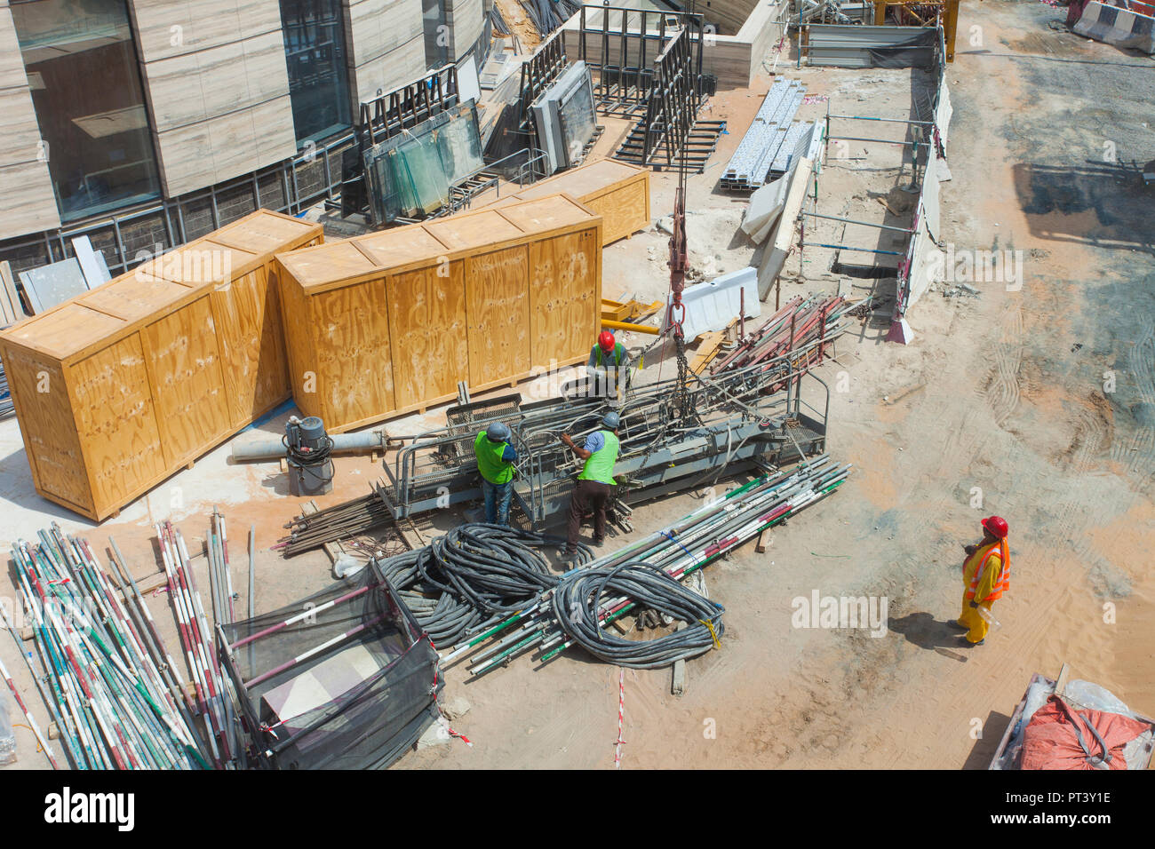 construction site with workers at building Stock Photo - Alamy