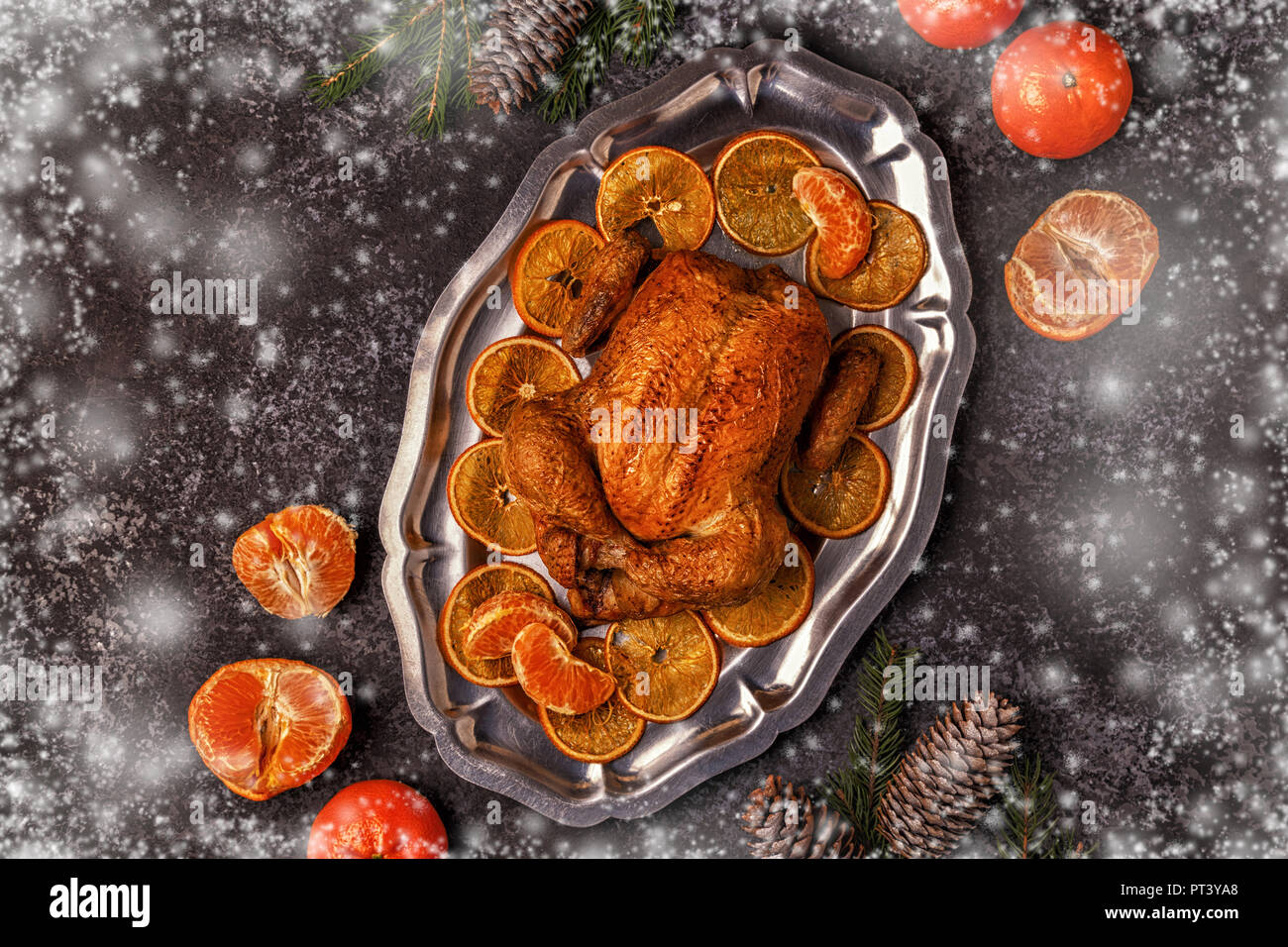 Roasted whole chicken with Christmas decoration. Top view, copy space ...