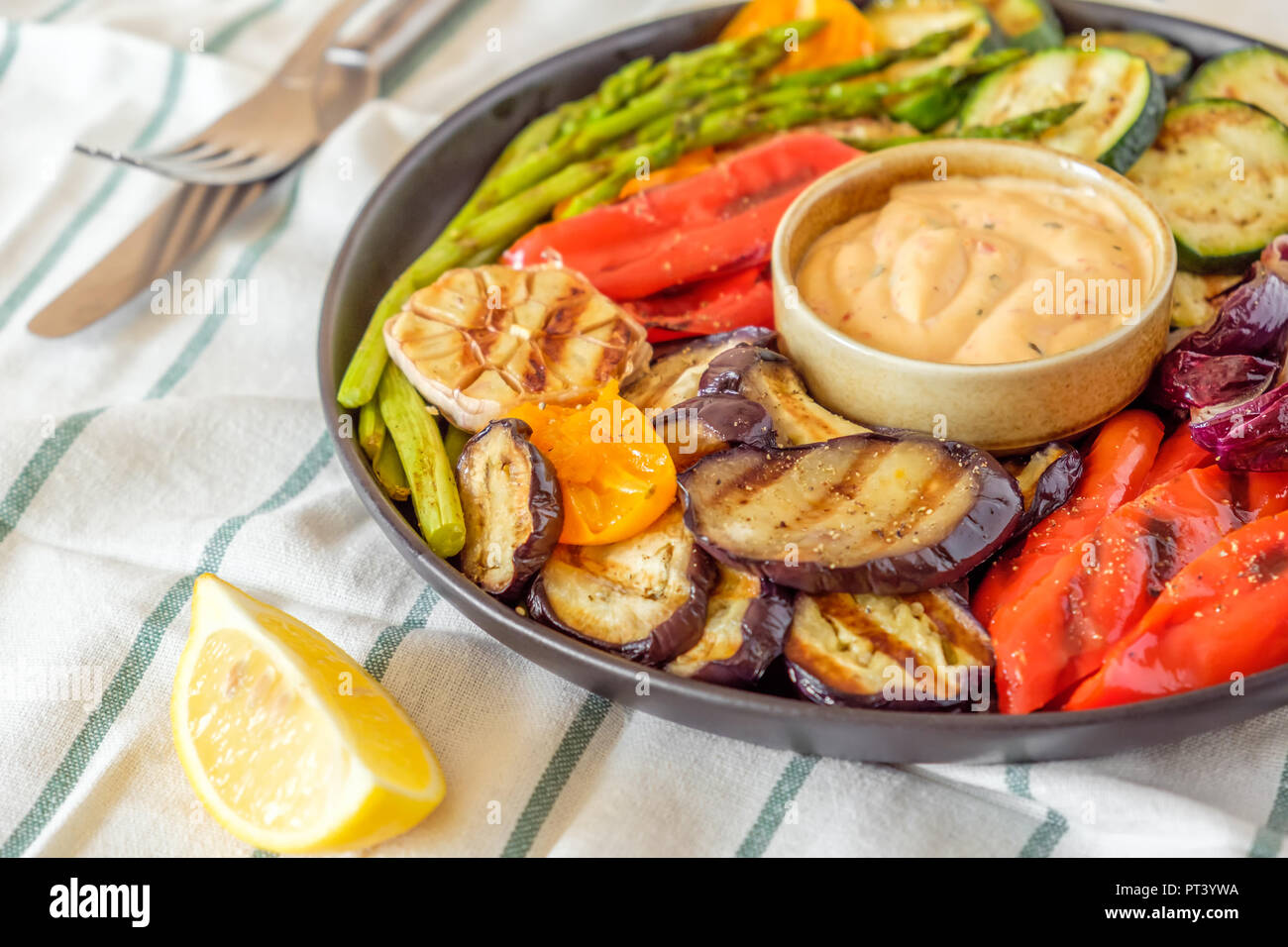 Grilled vegetables on a plate with sauce, selective focus Stock Photo ...