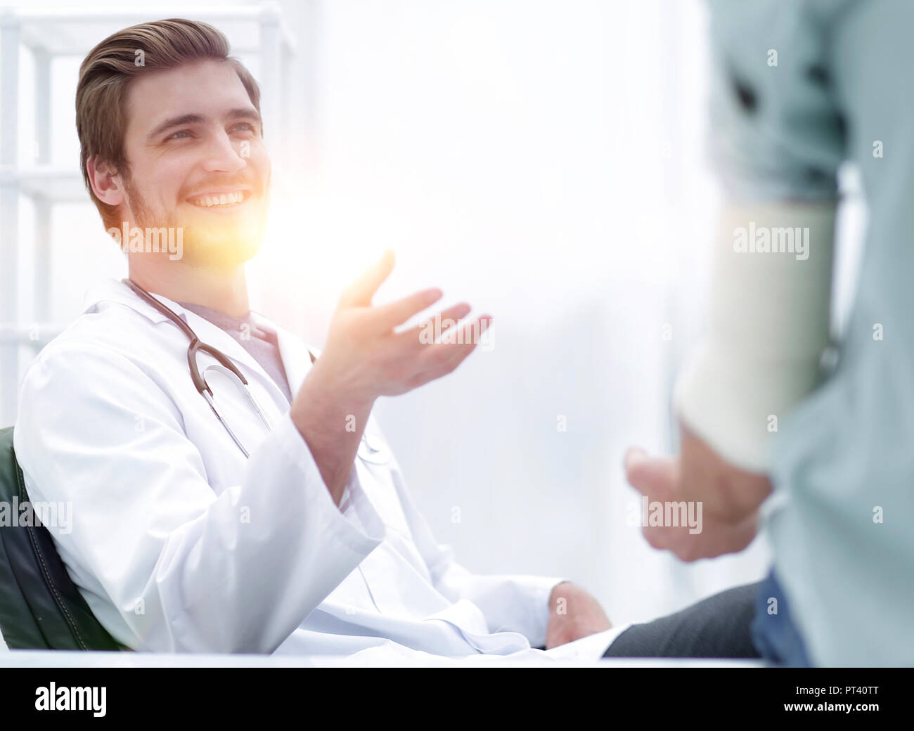 confident doctor explaining the patient's diagnosis.photo with copy ...