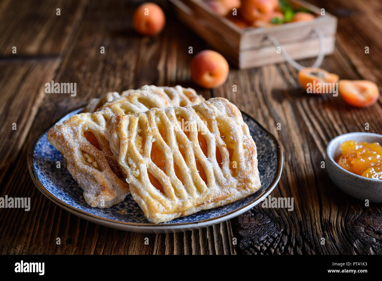 Delicious puff pastry pies filled with apricot jam and cottage cheese ...