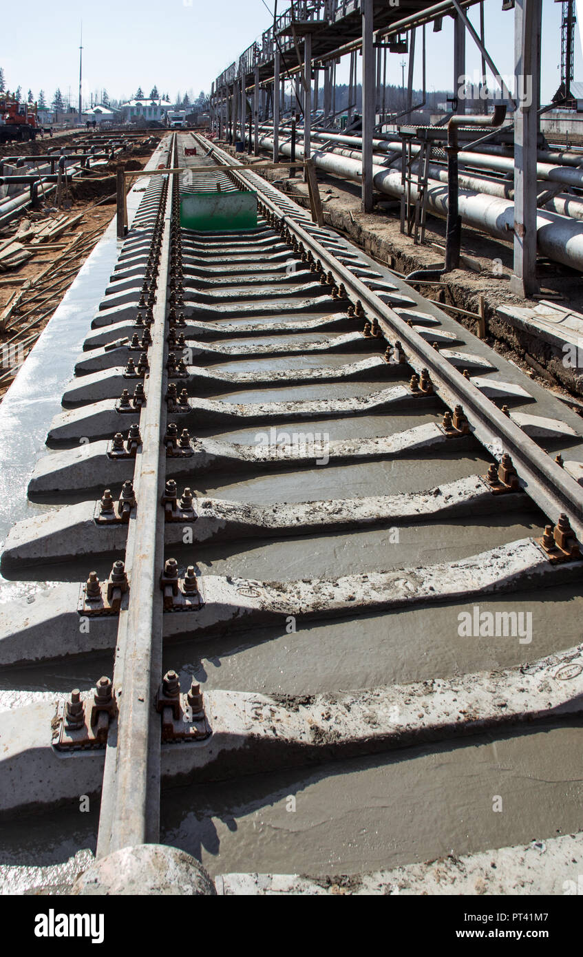 Railroad building with concrete Stock Photo - Alamy