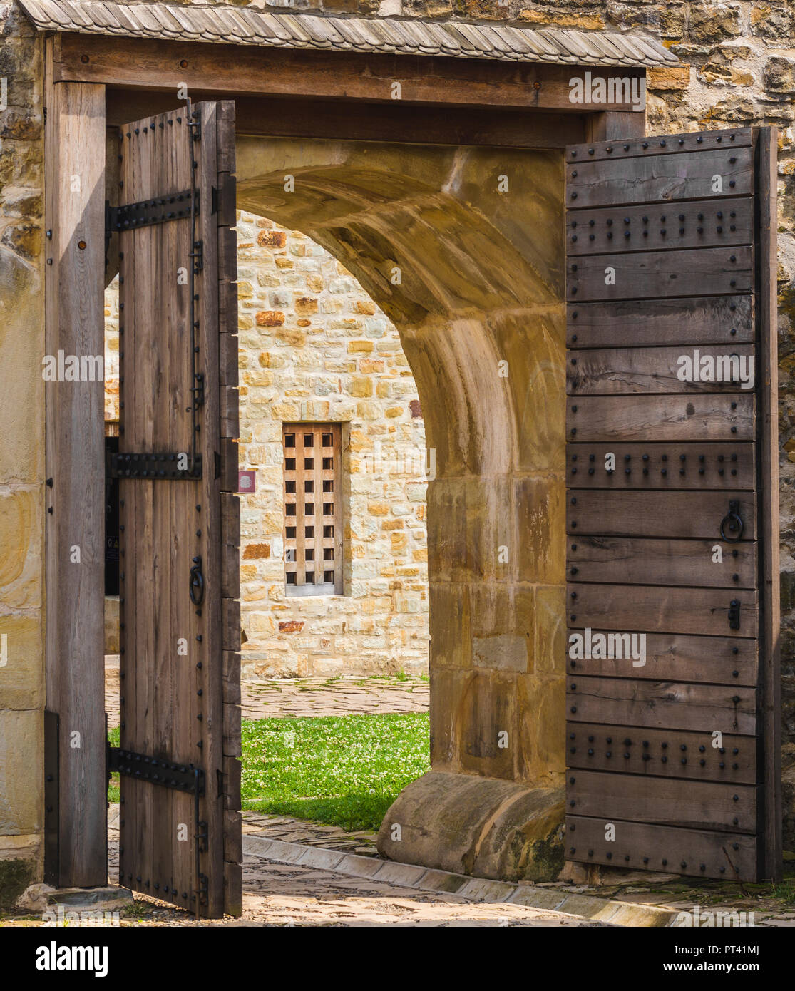 Entrance to old medieval fortress Stock Photo - Alamy