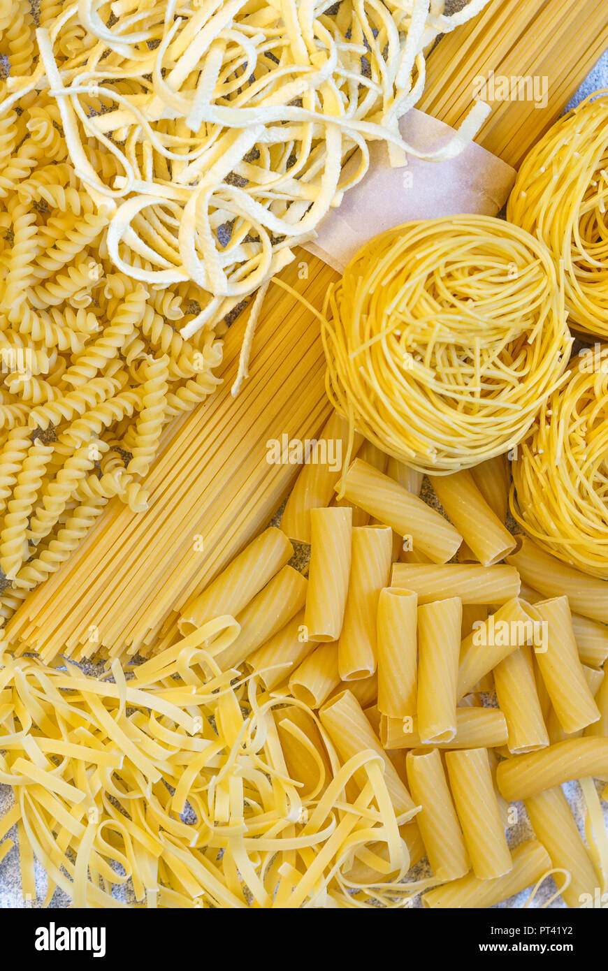 Fresh raw pasta from whole grain flour. Spaghetti, egg noodles ...
