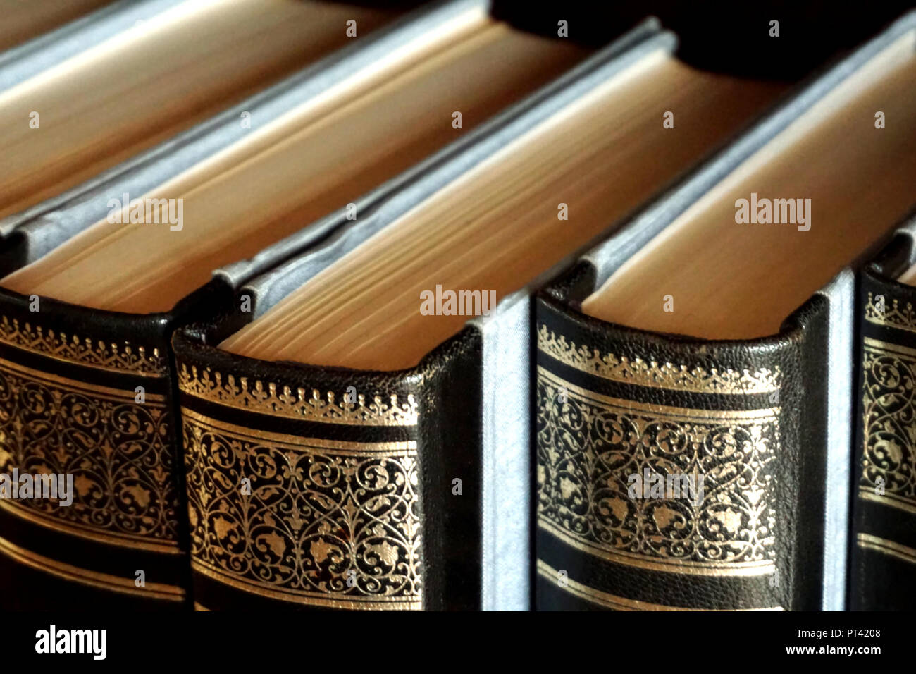 Books with decorative cover on the bookshelf, close up top view Stock ...