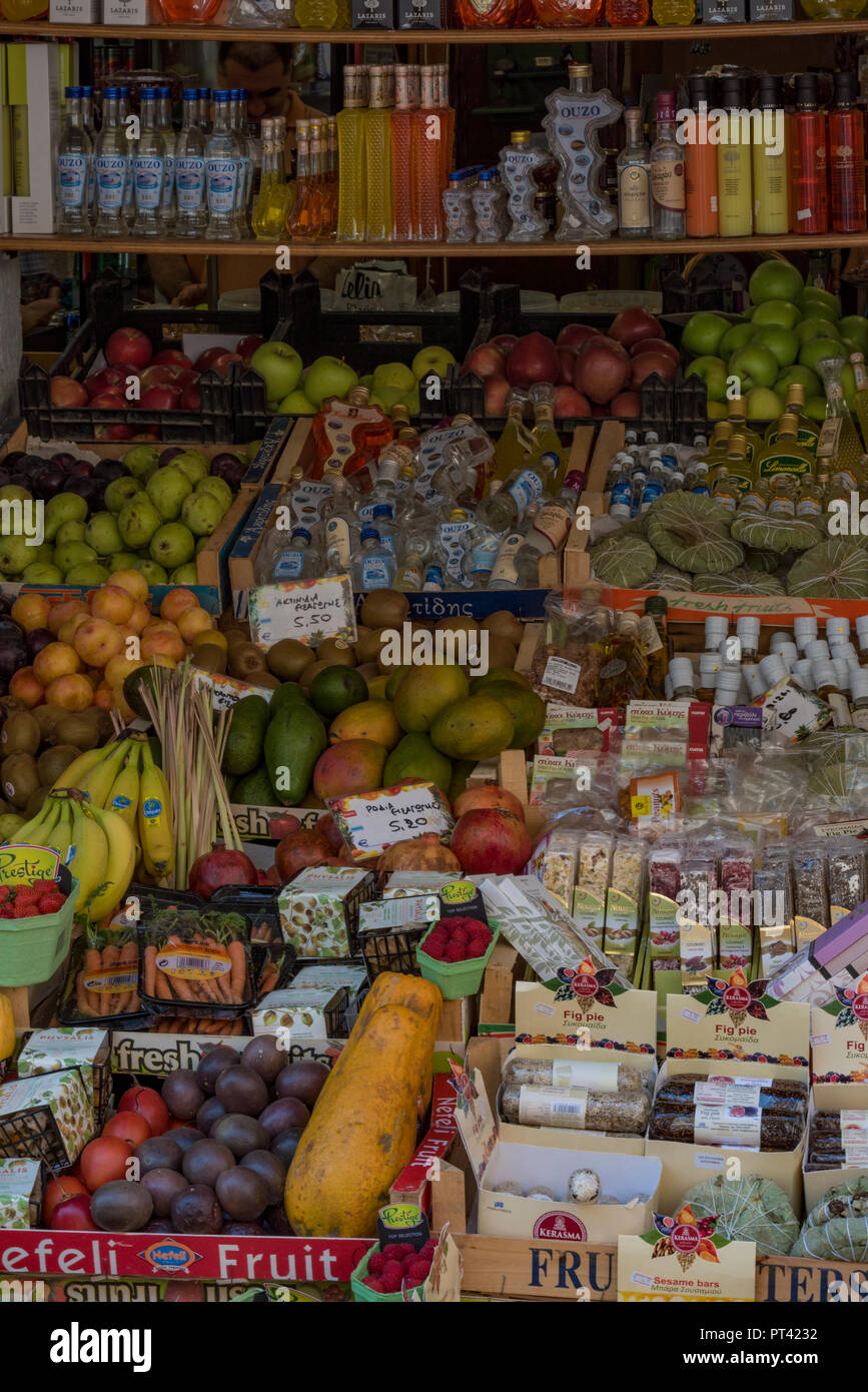 a large selection of colourful fresh fruits and vegetables on sale at a ...