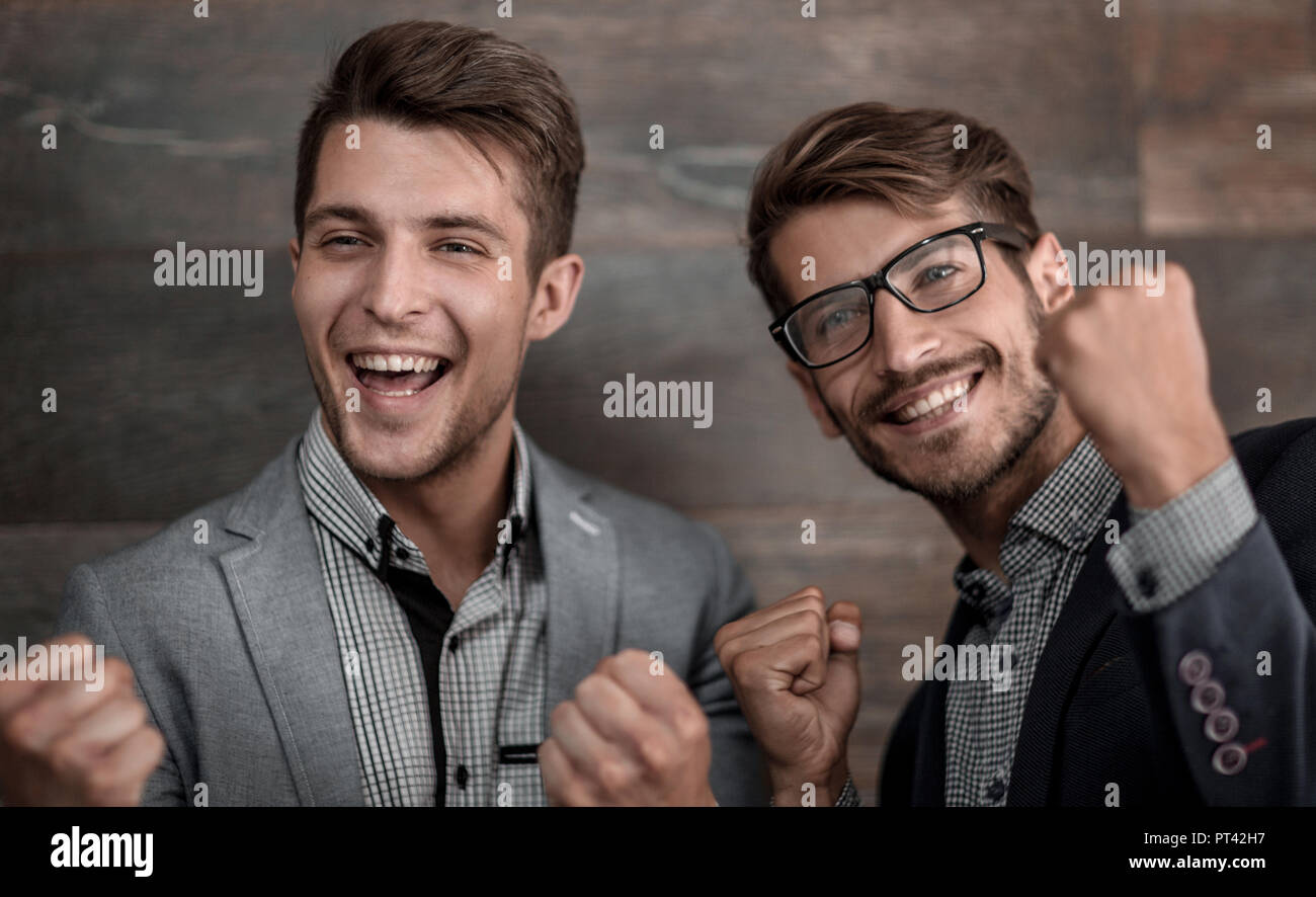 Two men having fun isolated over grey wall with copy space Stock Photo ...