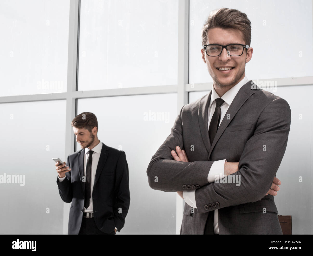 confident, businessman, against, background, office Stock Photo - Alamy