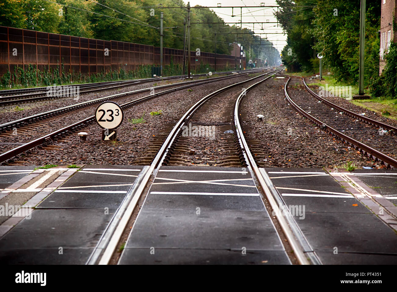 Train tracks in a station, transport detail by rails, trip Stock Photo ...