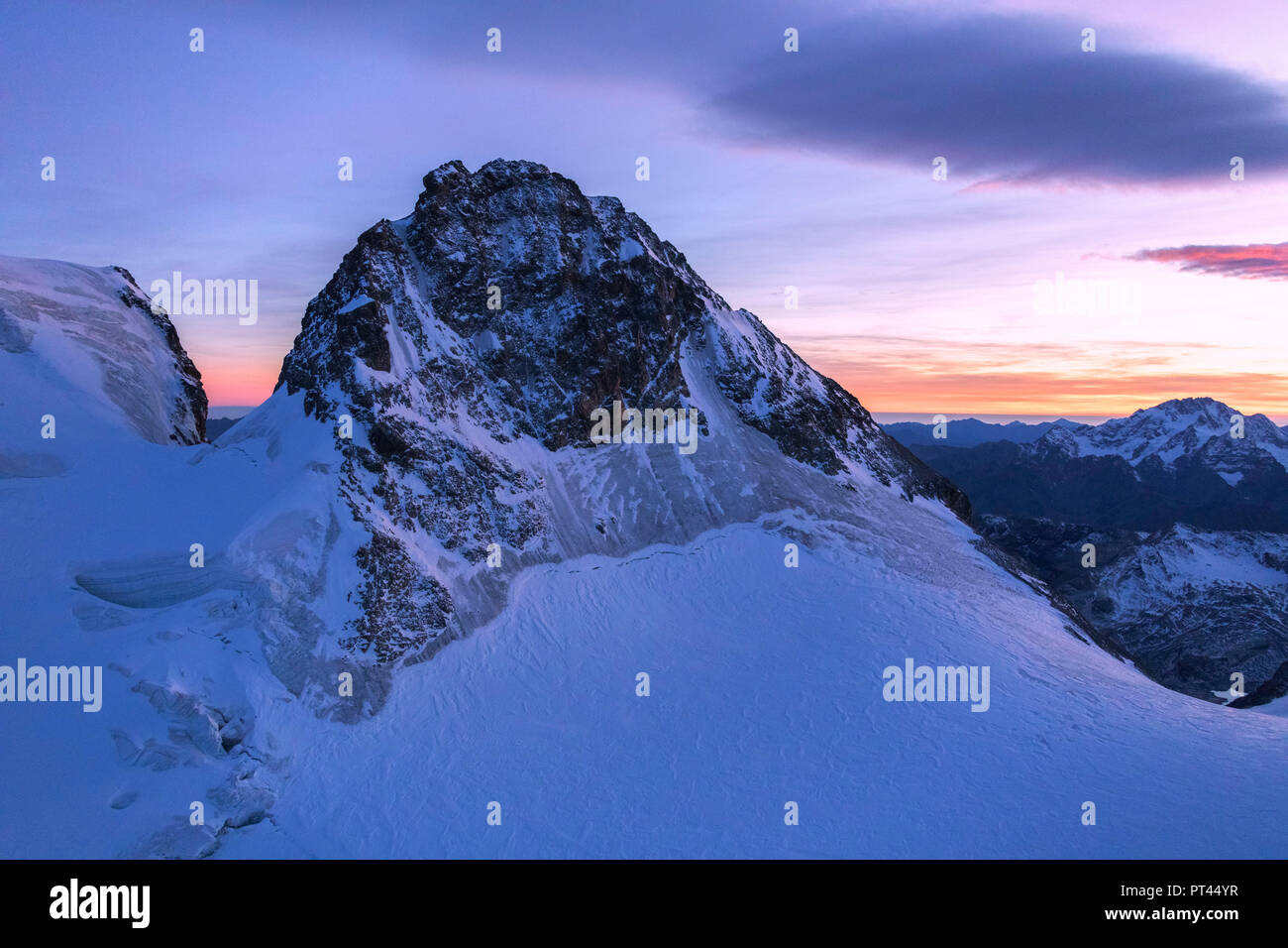 Aerial view of the snowy peak of Cresta Guzza towards Piz Bernina ...