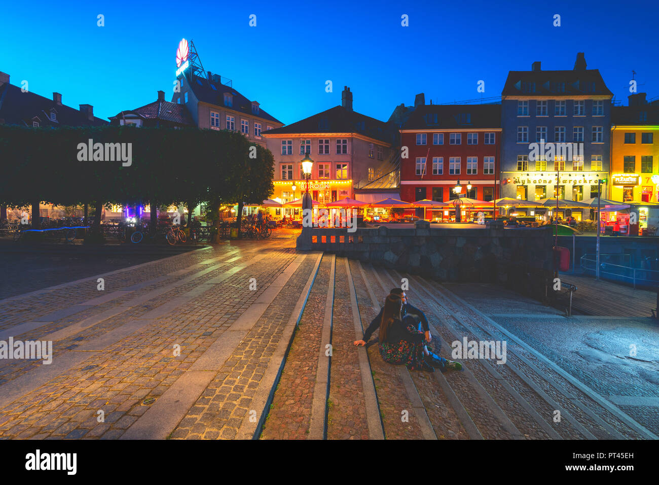 Tourist in Nyhavn, Copenhagen, Hovedstaden, Denmark, Northern Europe ...