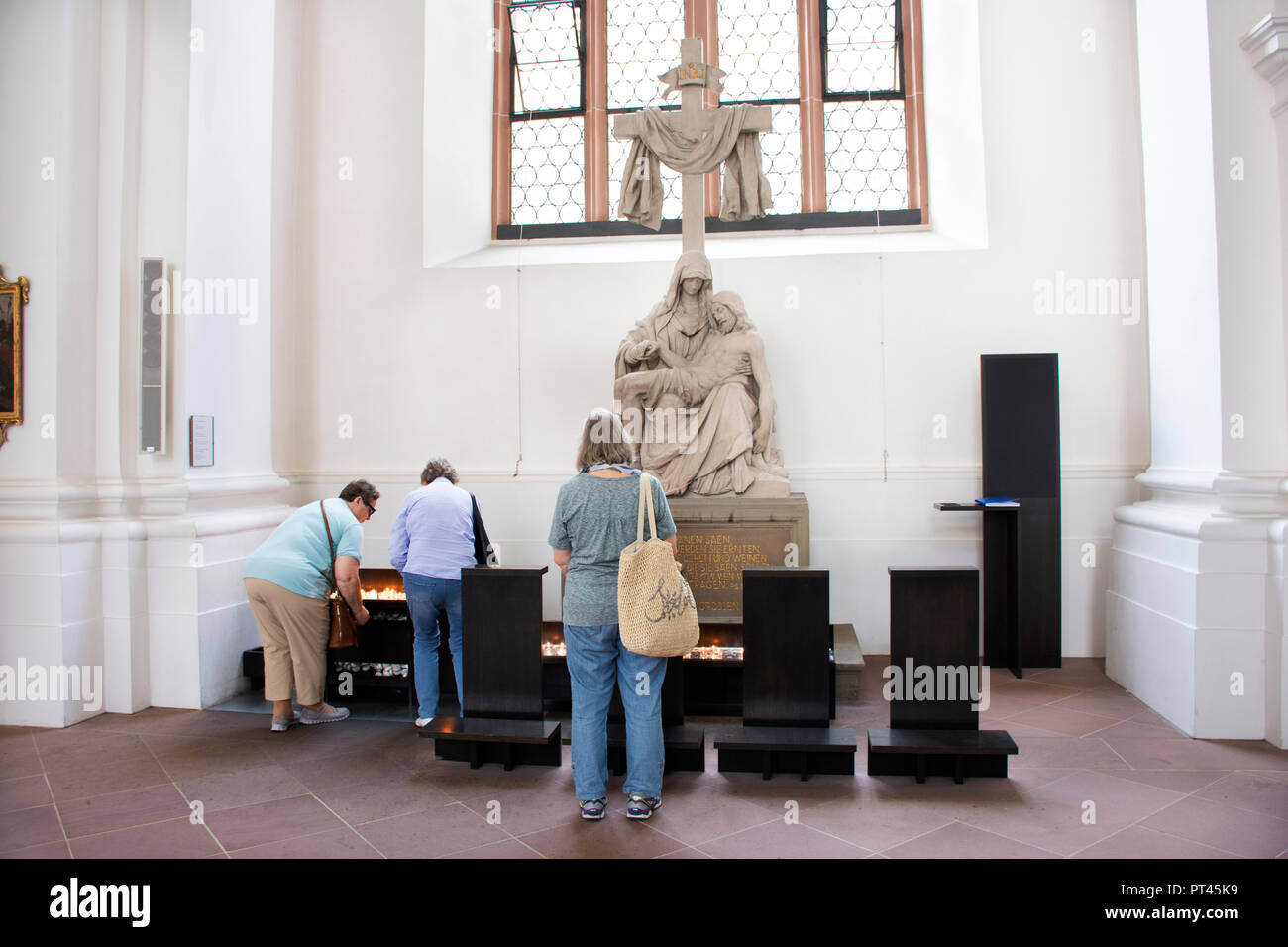 German people burn candle for remember and praying respect to Blessed ...