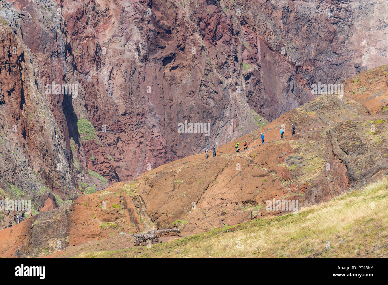 People walking on PR8 trail that leads to Point of St Lawrence, Machico ...