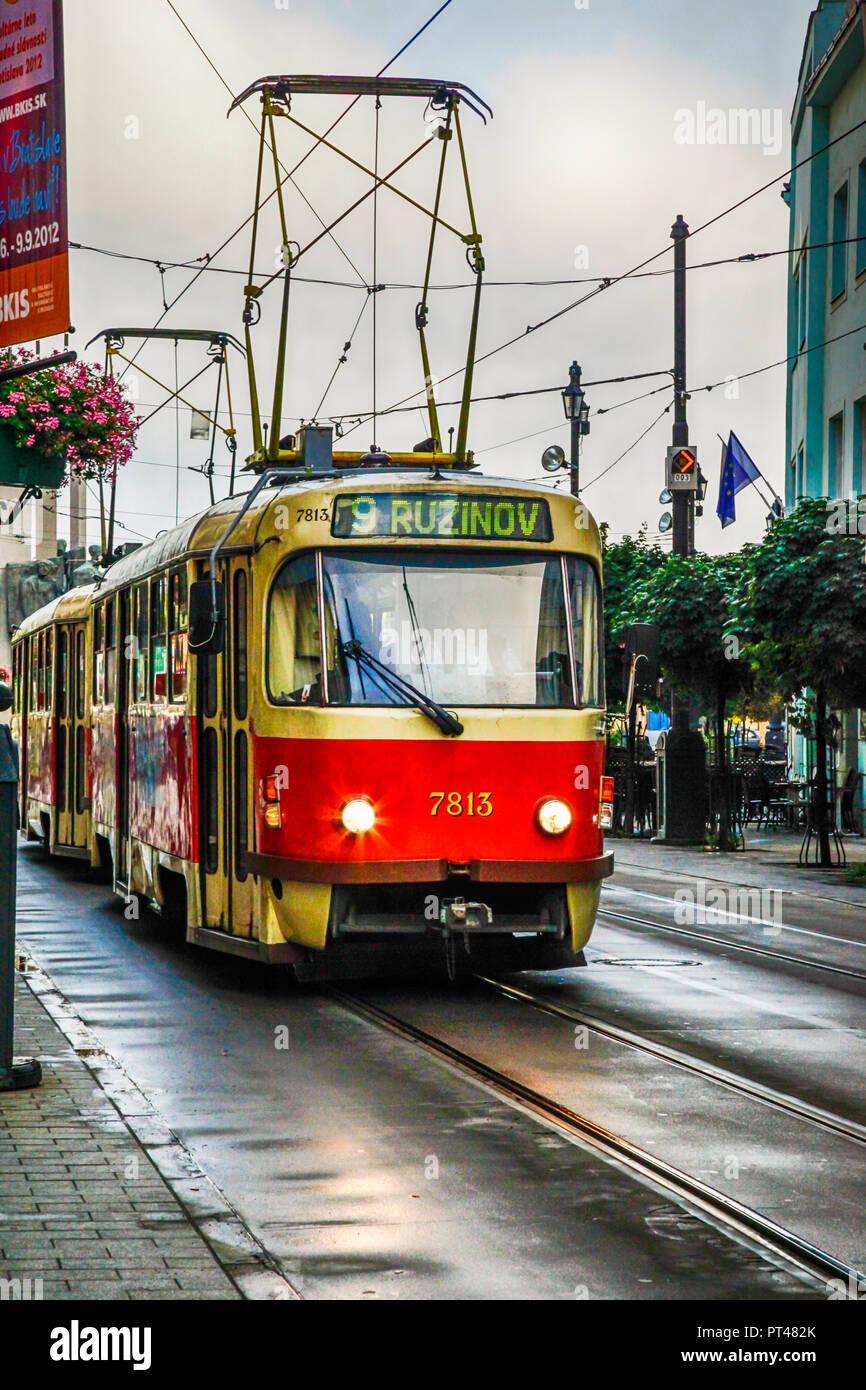 Red trams offering public transport around the city of Bratislava in ...